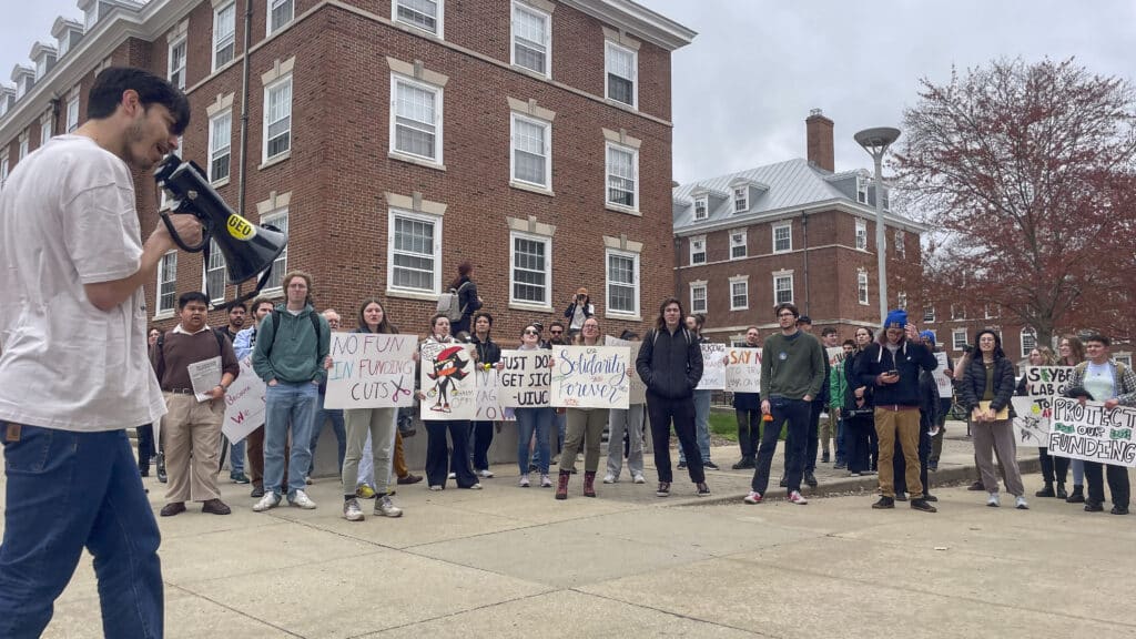 Graduate students rally for better health care and higher wages at the ...